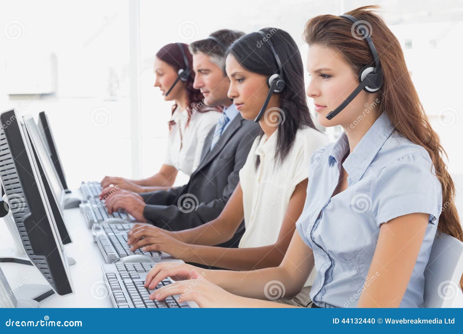 Employees Typing on Their Computers Stock Photo - Image of businessman ...