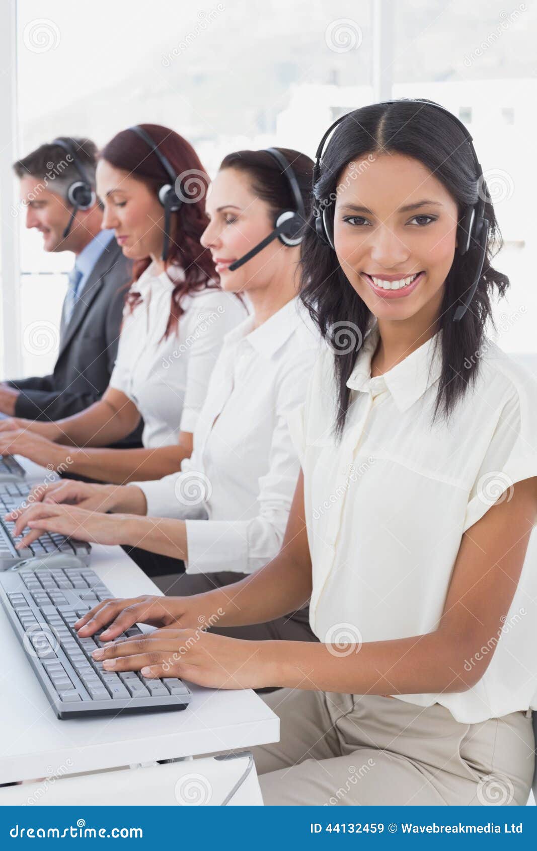 Employees Typing on Their Computers Stock Image - Image of looking ...