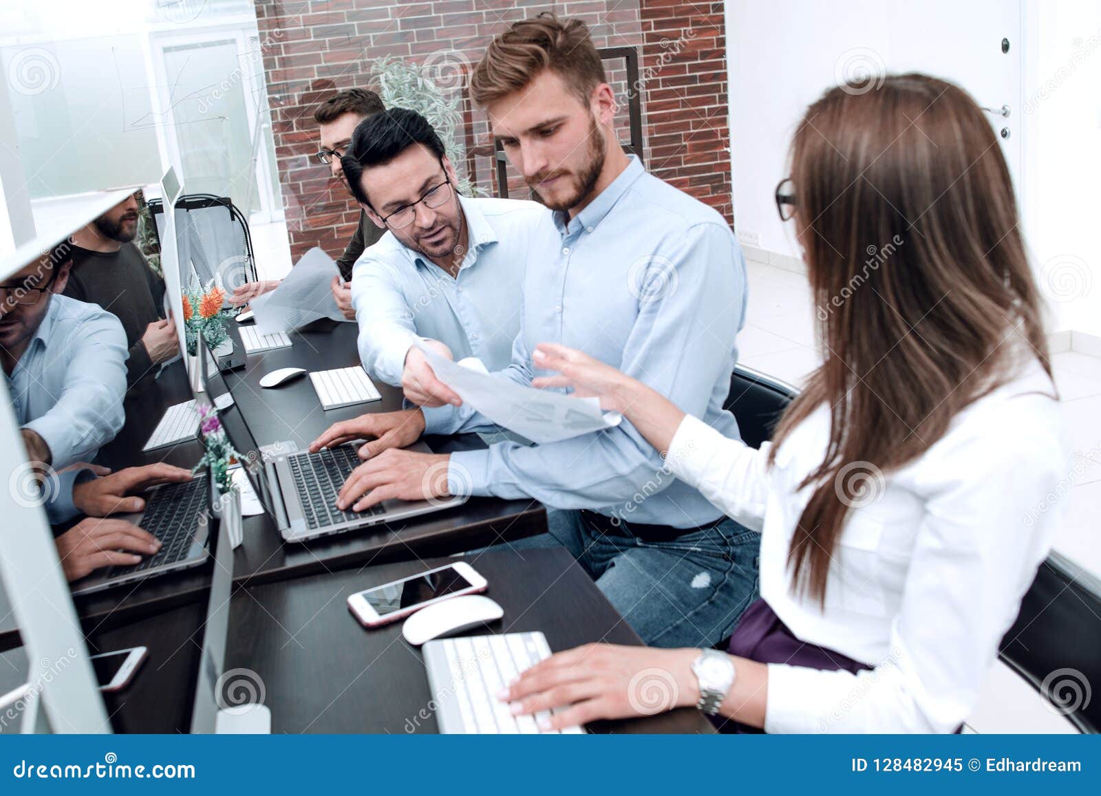 Employees Use Computers To Work with Business Documents Stock Image ...