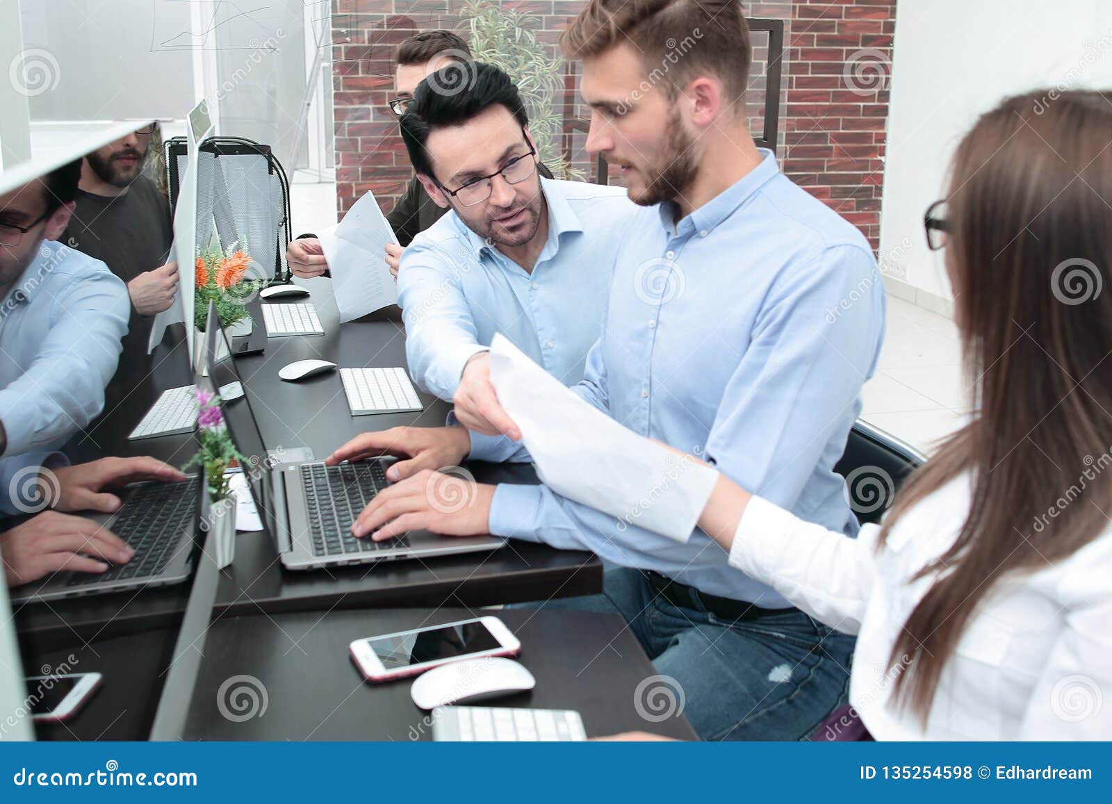 Employees Use Computers To Work with Business Documents Stock Photo ...