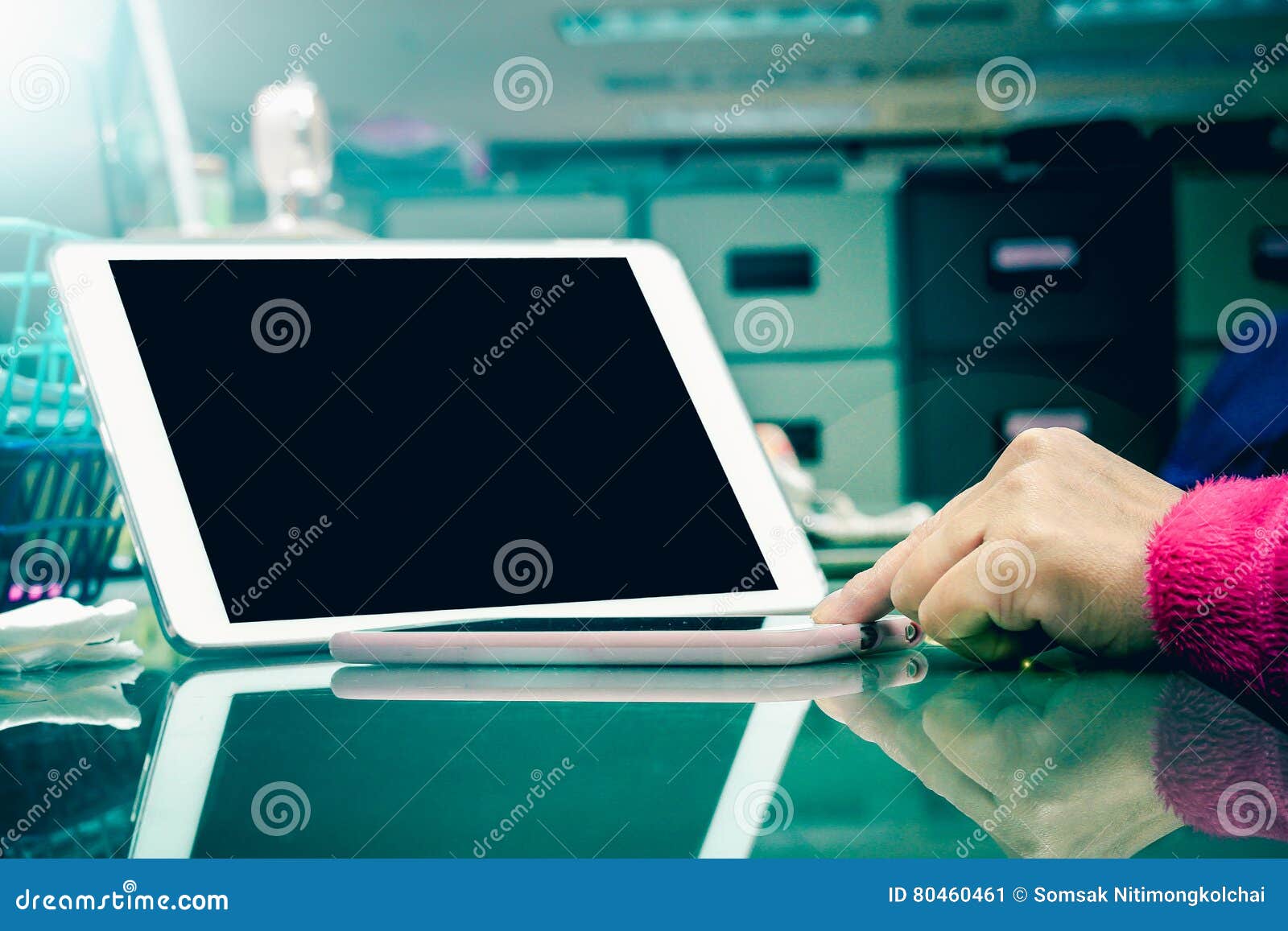 Employees Using the Mobile Phone and Tablet on Office Table. Stock ...