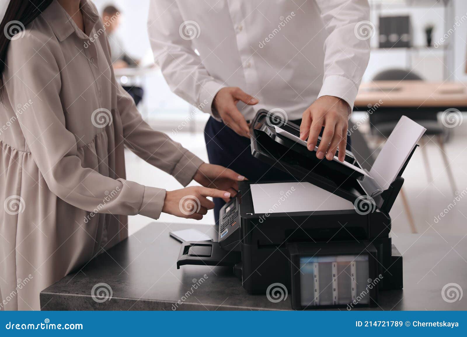 Employees Using Modern Printer in Office, Closeup Stock Image - Image ...