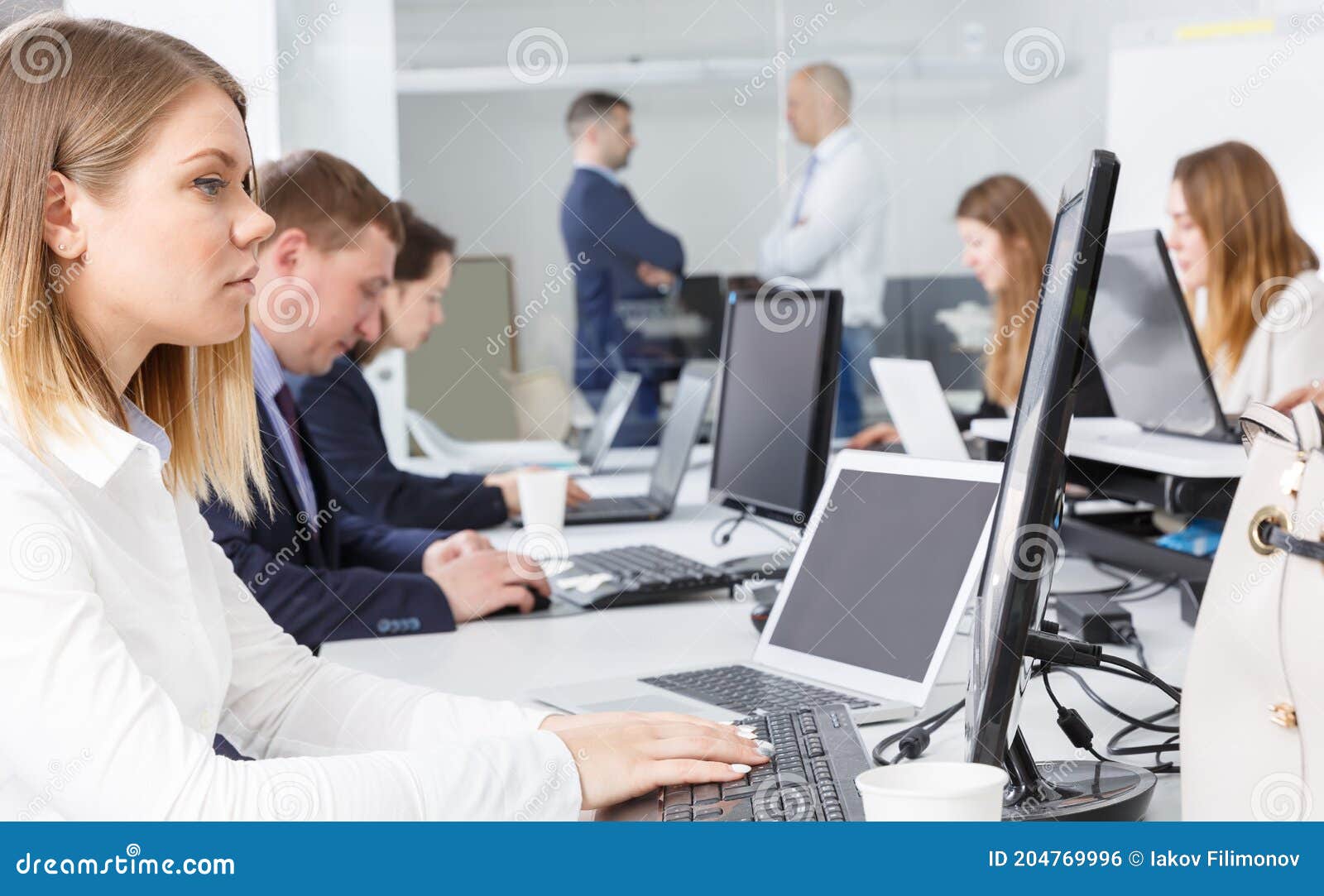 Employees Work on Laptops in the Workplace Stock Photo - Image of ...