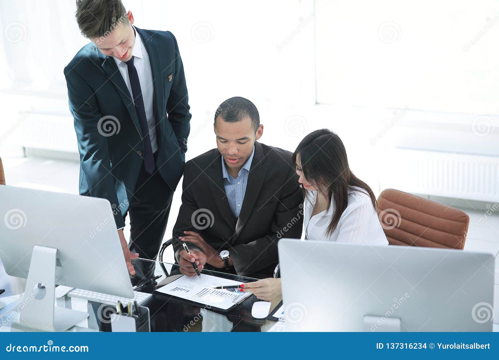 Employees Working with Financial Documents in the Office. Stock Photo ...