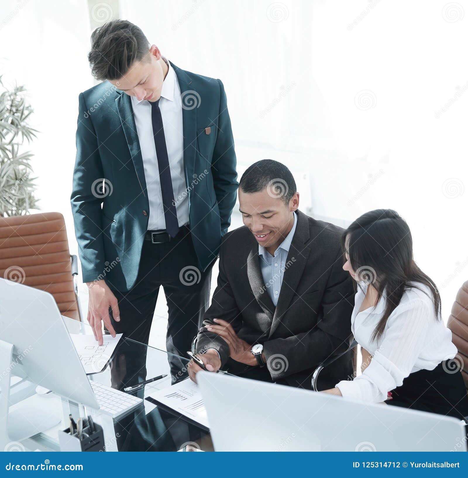 Employees Working with Financial Documents in the Office. Stock Photo ...