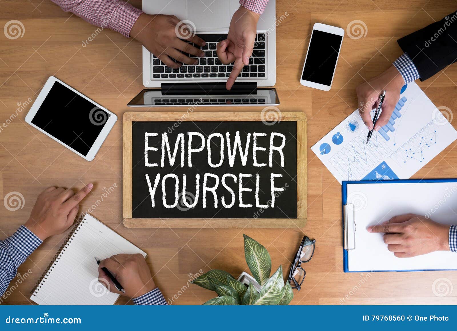 EMPOWER YOURSELF Businessman Working at Office Desk and Using a Stock ...