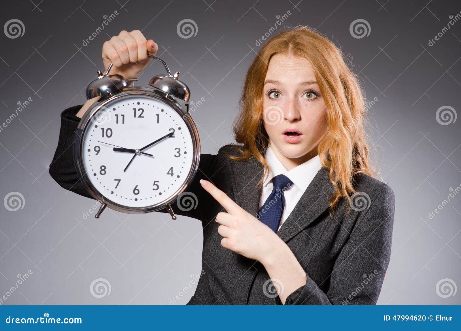 Empresaria Con El Reloj Que Es Atrasado Foto de archivo - Imagen de ...
