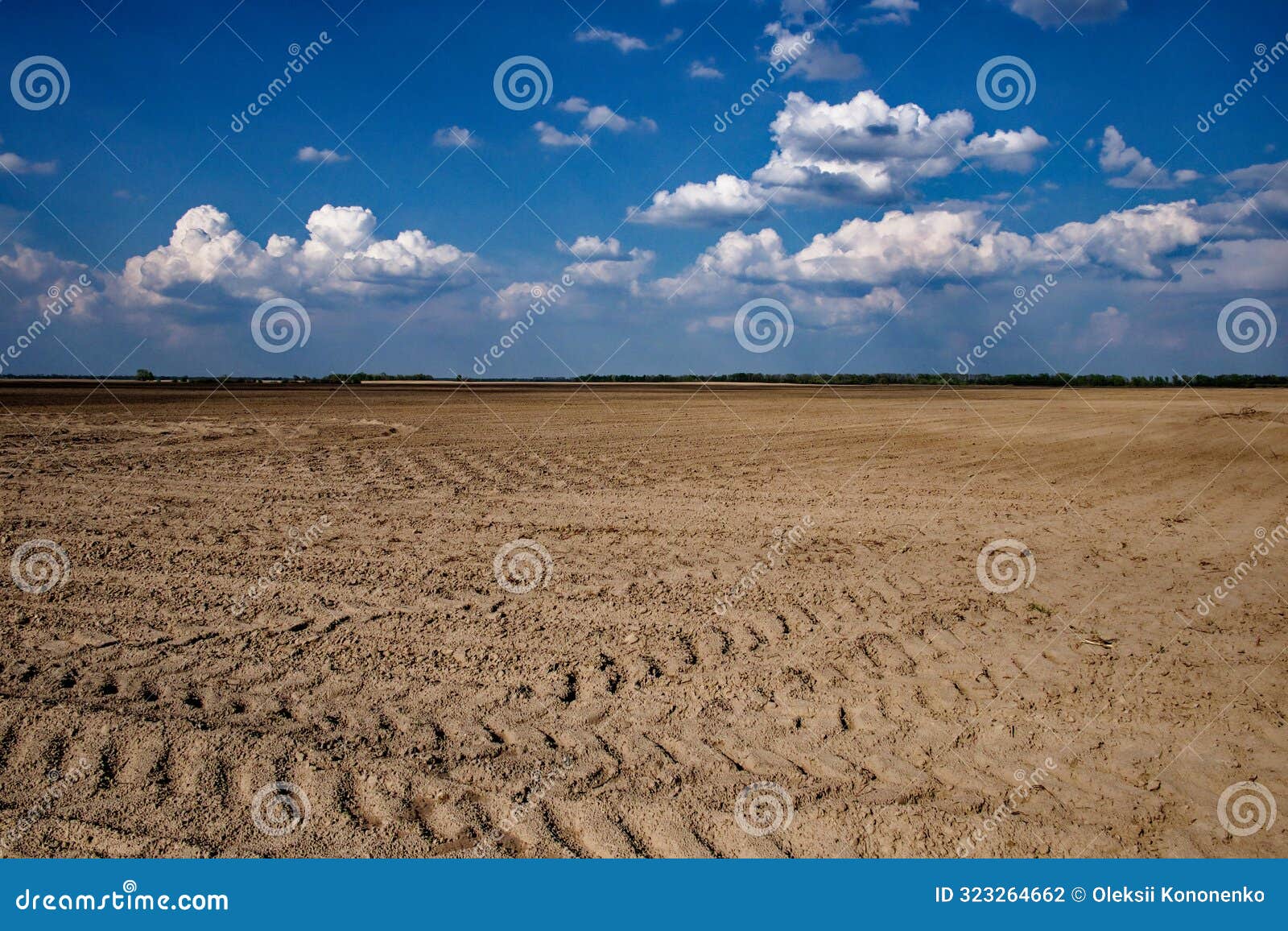 Empty Agricultural Land with Patterned Soil and Clouds Above Stock ...