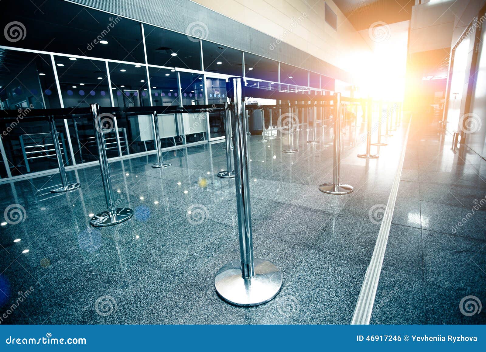 Empty Airport Check-in Line Lit by Sun Beam Stock Photo - Image of ...