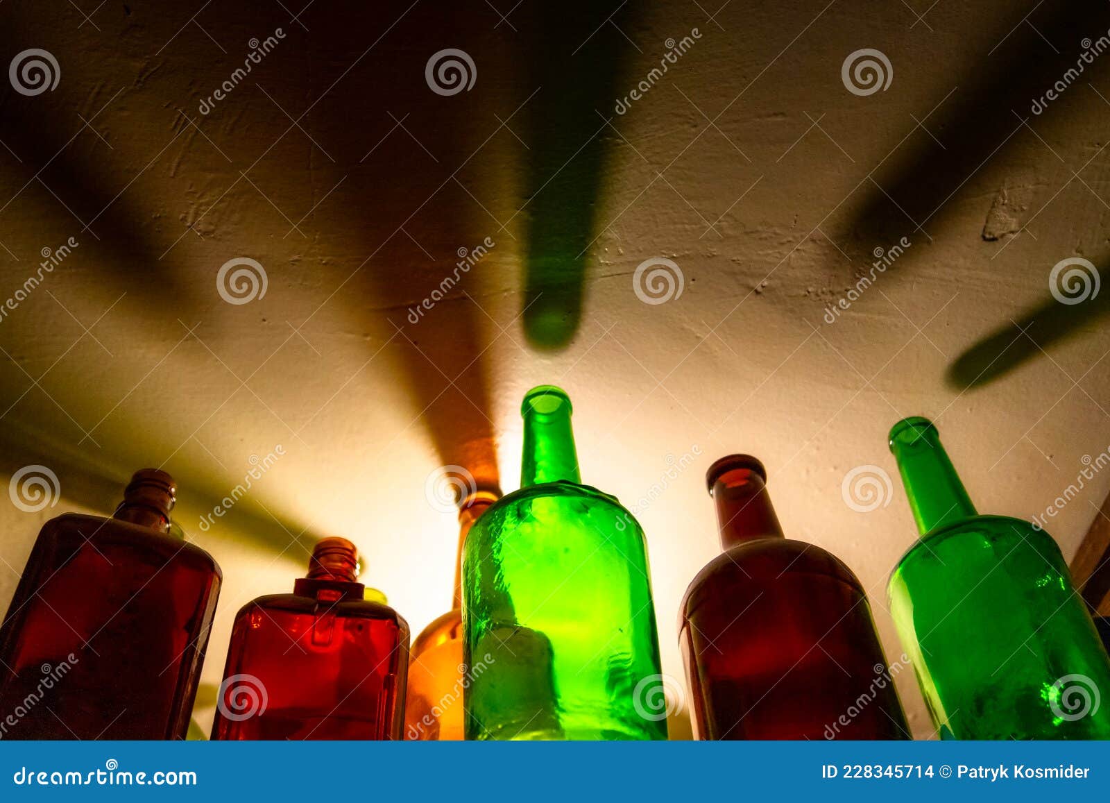 Empty Alcohol Bottles Casting a Shadow on the Ceiling Stock Photo ...