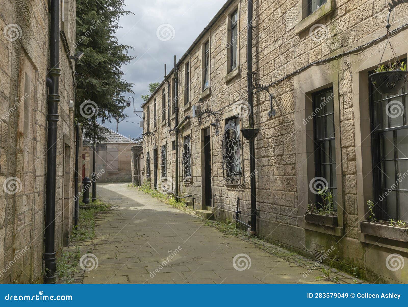Empty Alleyway with No One Around Stock Image - Image of brick, blue ...