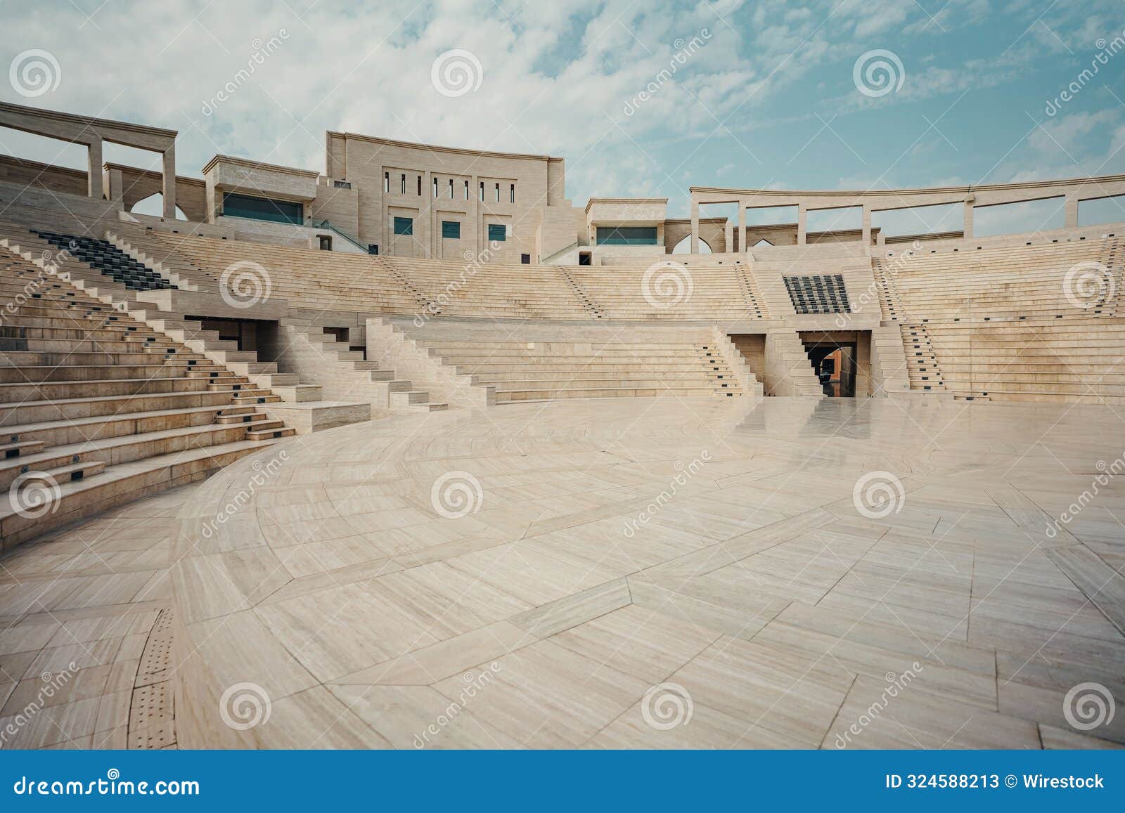 Empty Amphitheater with Stone Seating and Clear Sky in the Background ...