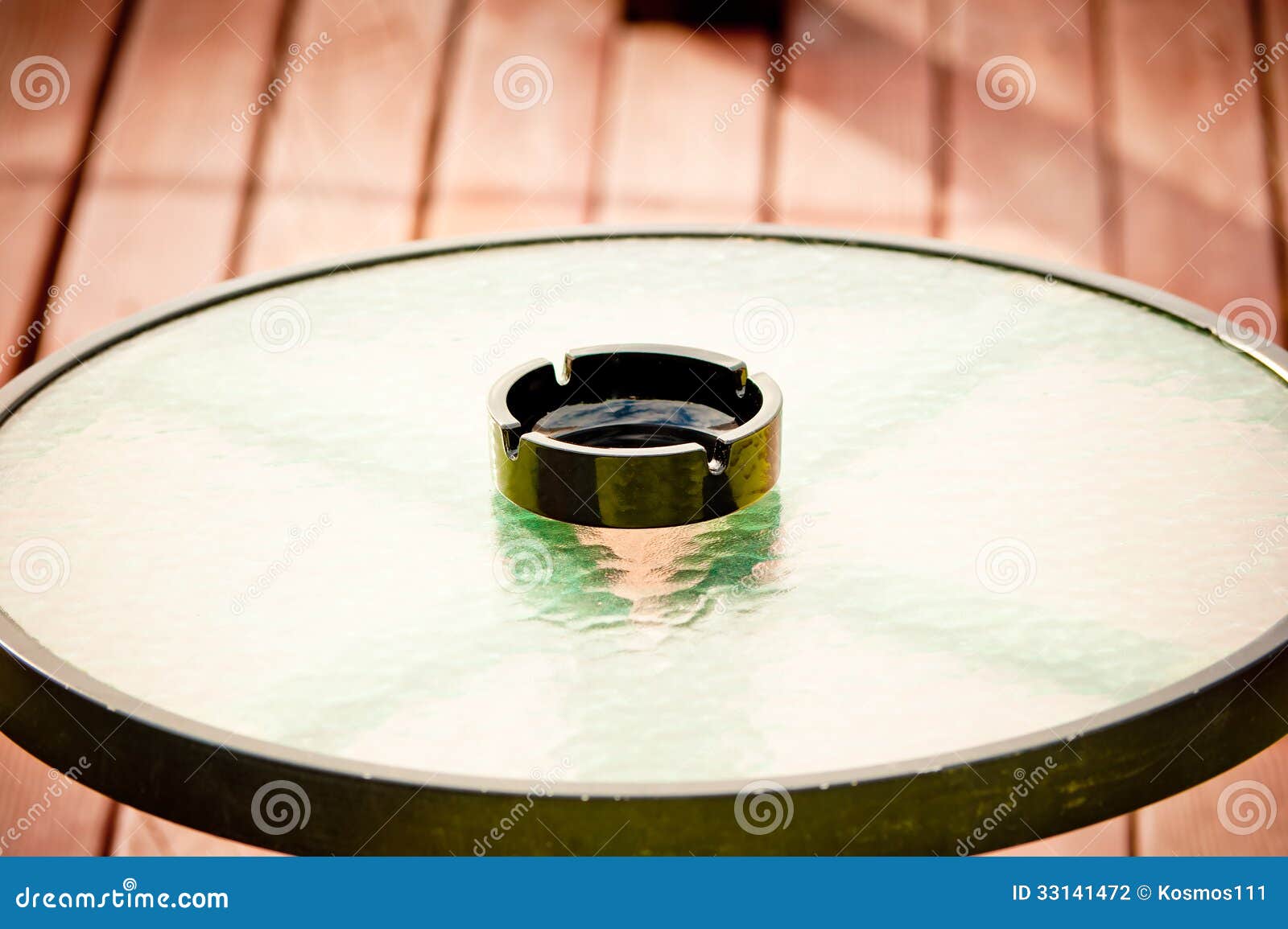 Empty Ashtray Stands in the Middle of a Round Glass Table Stock Photo ...