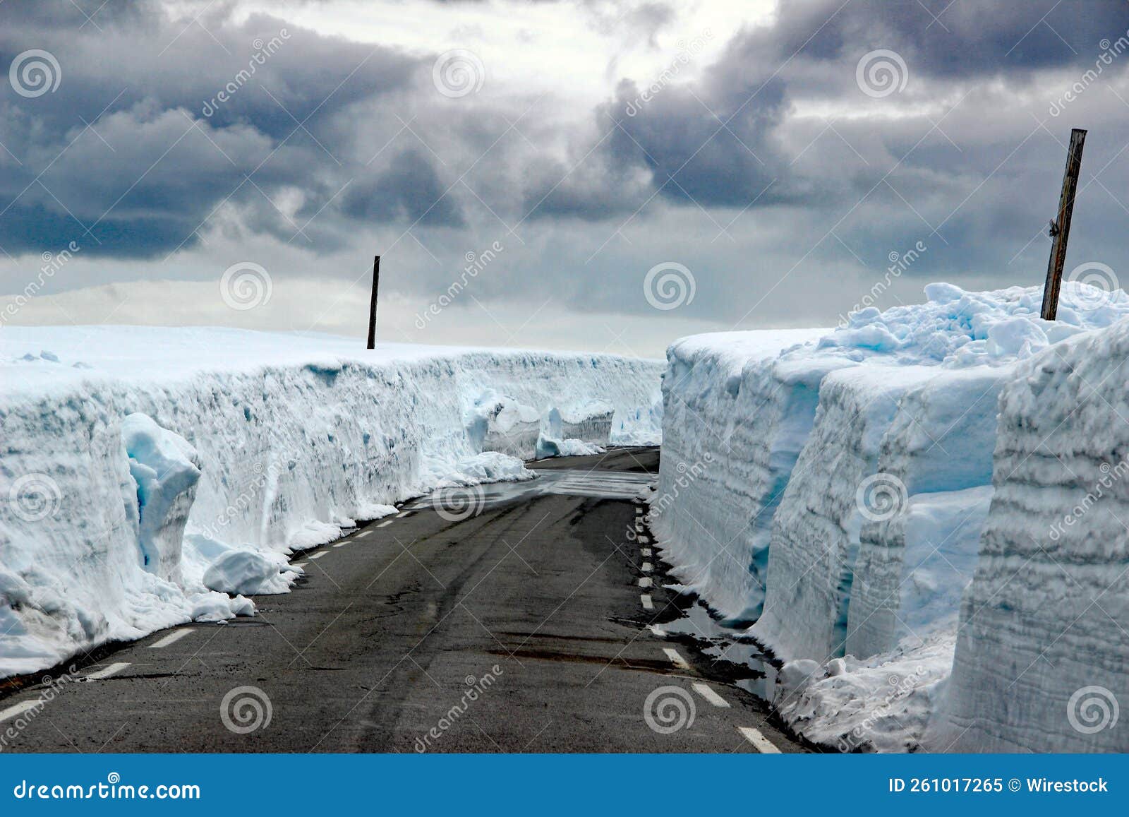 Empty Road Running between the Masses of Snow. Stock Image - Image of ...