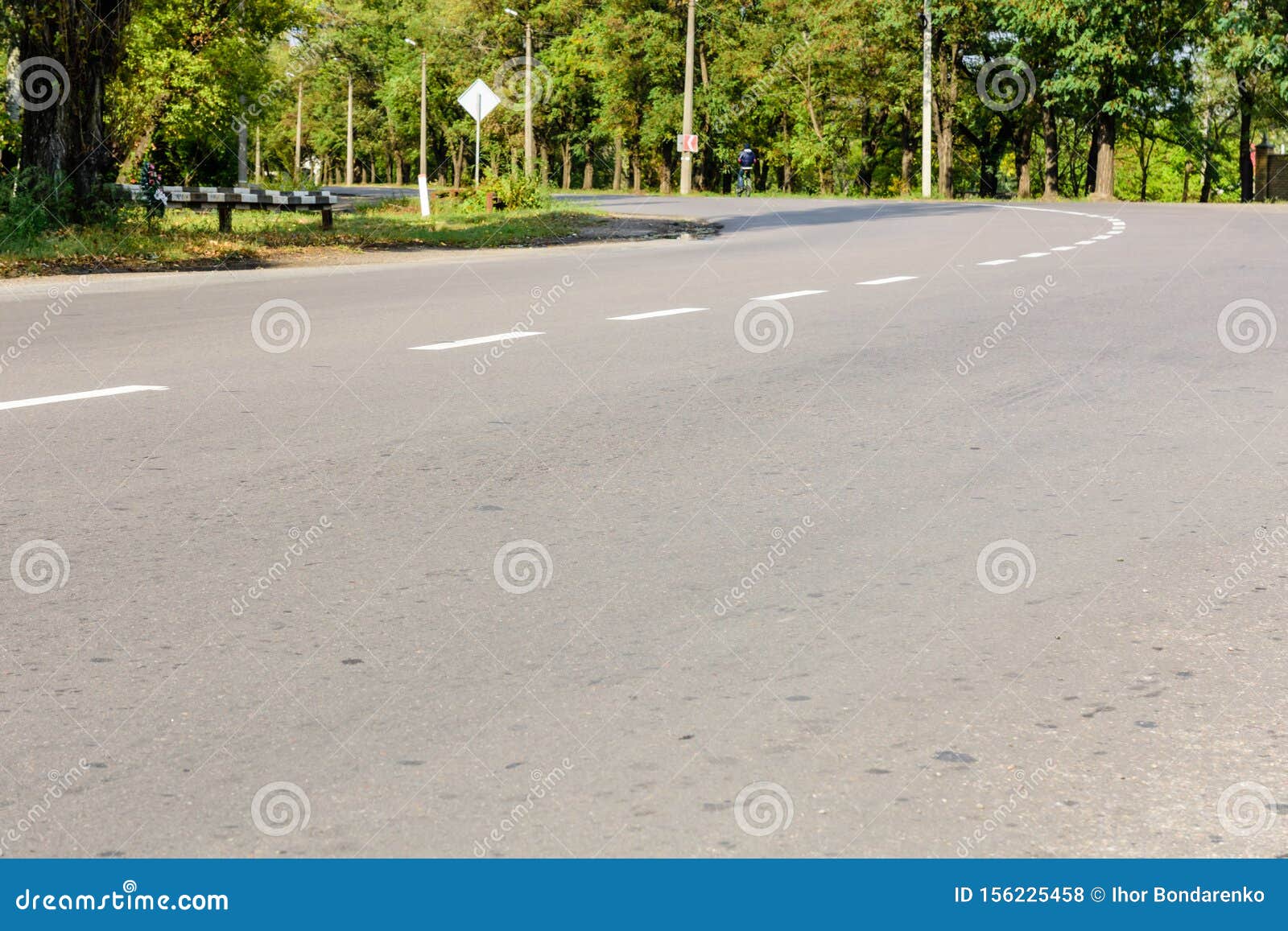 Empty Asphalt Road with White Markings Stock Photo - Image of building ...