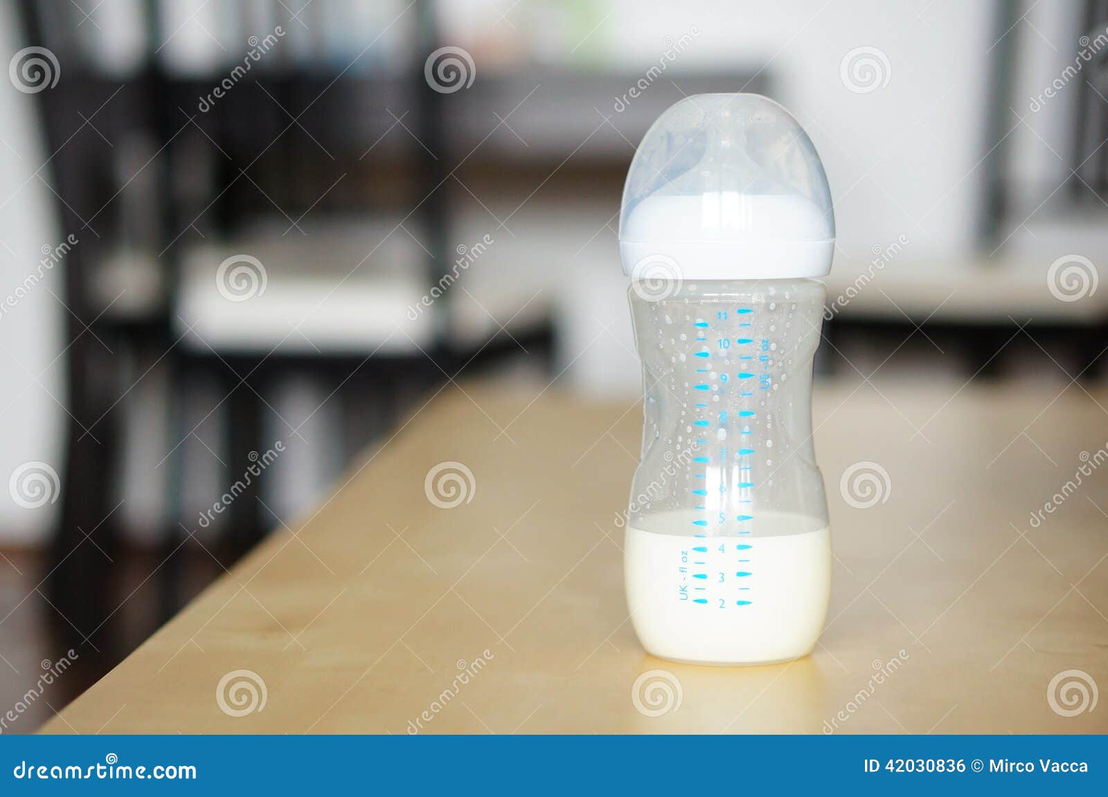 Almost empty baby bottle stock photo. Image of healthy - 42030836