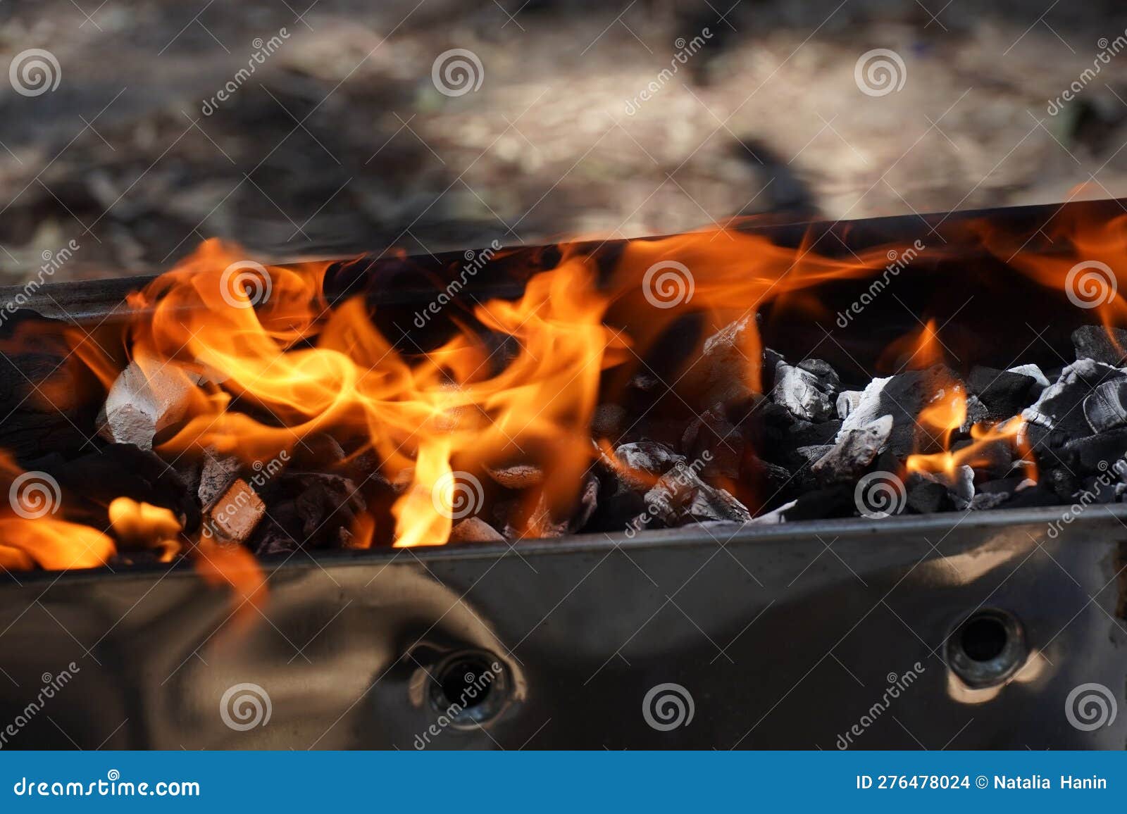 Empty Barbecue Flaming Grill Close Up with Bright Flames and White ...