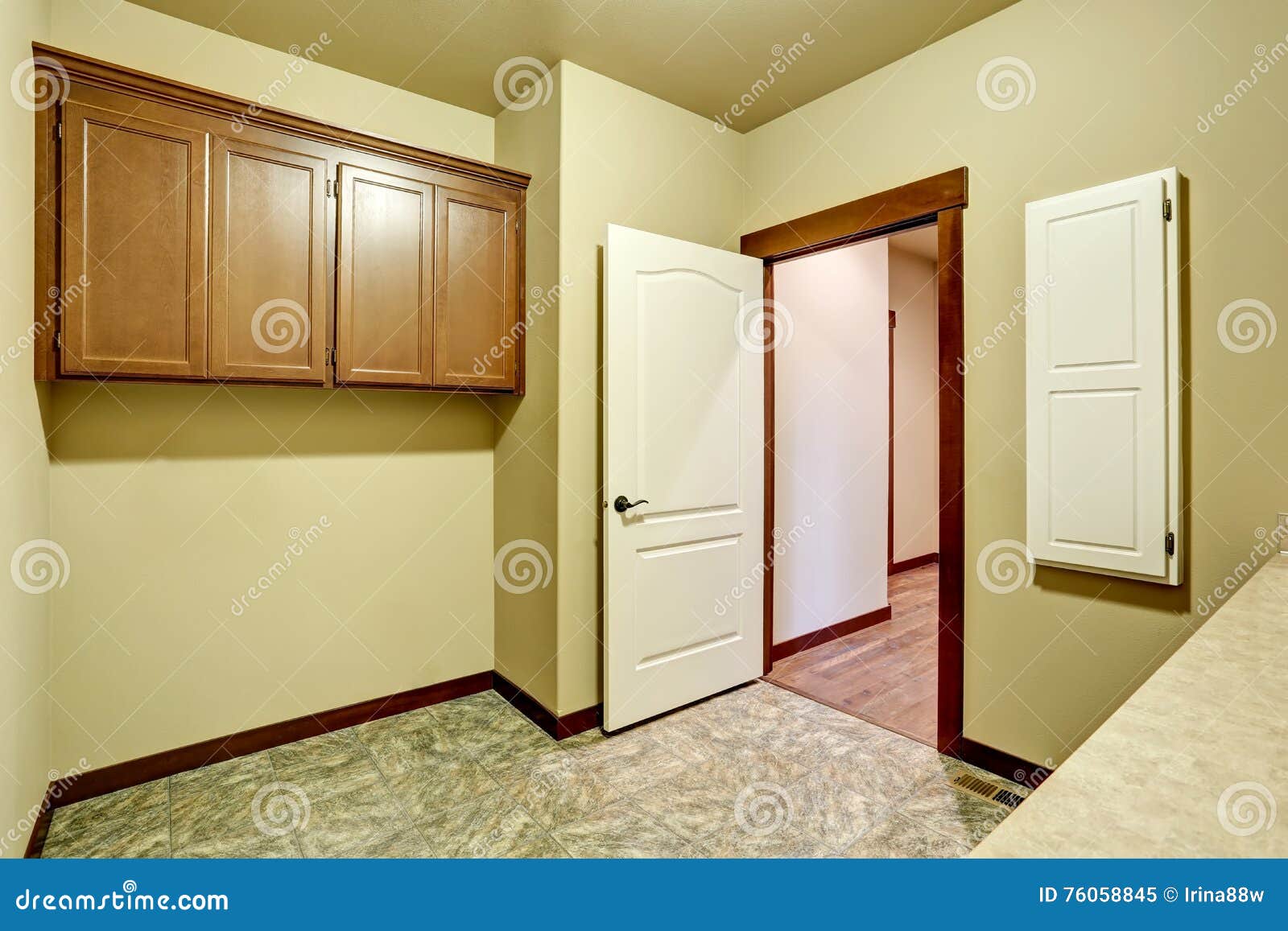 Empty Bathroom Interior with Vanity Cabinet and Tile Floor. Stock Image ...