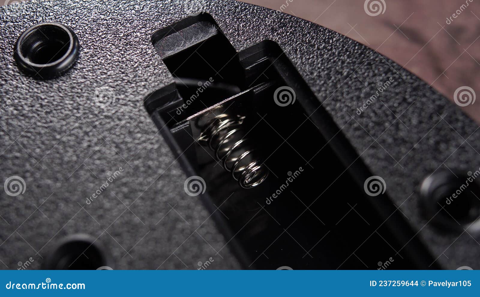 Empty Battery Compartment of a Black Plastic Electronic Device with a ...