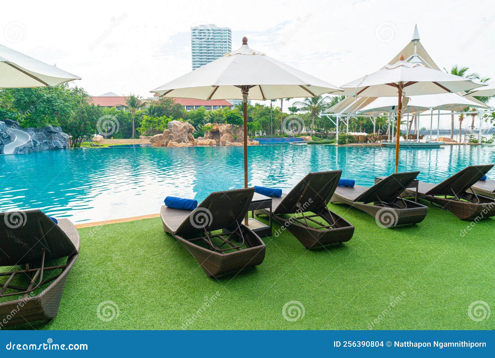 Empty Beach Chair Around Swimming Pool Stock Photo - Image of lounge ...