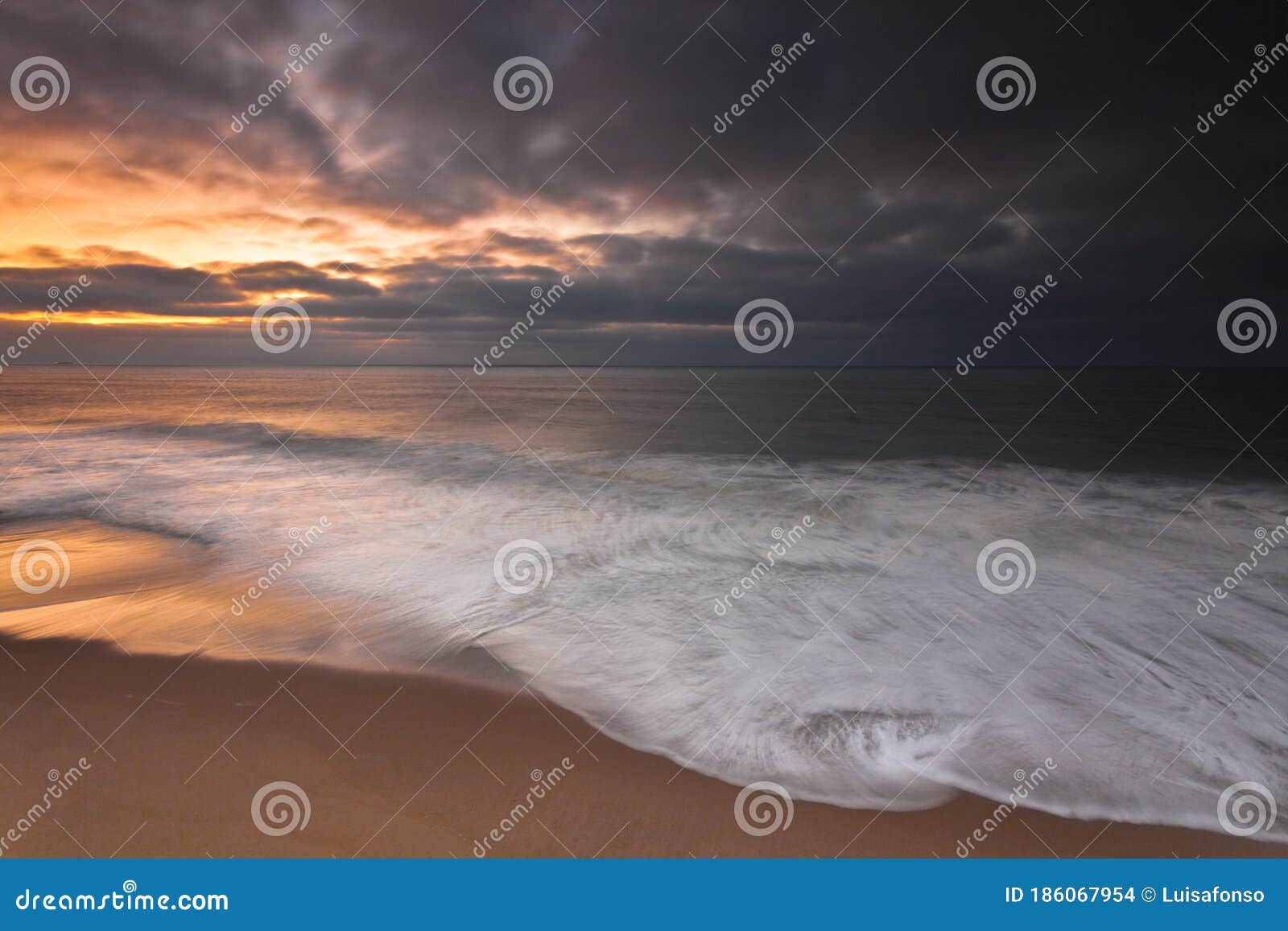 Empty beach at sunset stock photo. Image of ocean, beautiful - 186067954