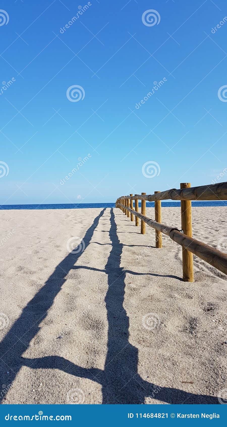 Empty Beach by the Sea with Fence Stock Image - Image of coast, shadow ...