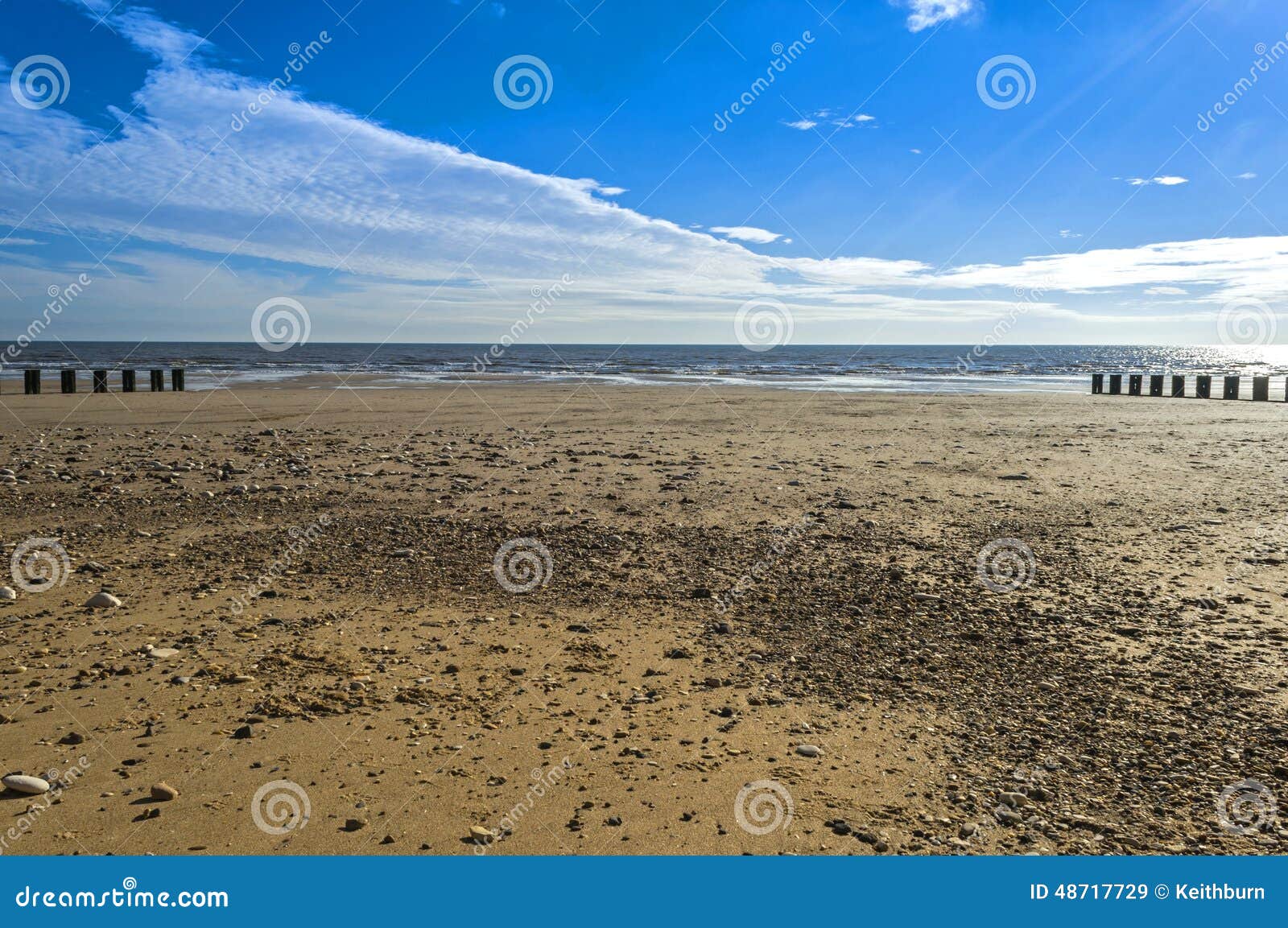 Empty Beach Under Blue Sky at Seaside Stock Image - Image of distant ...