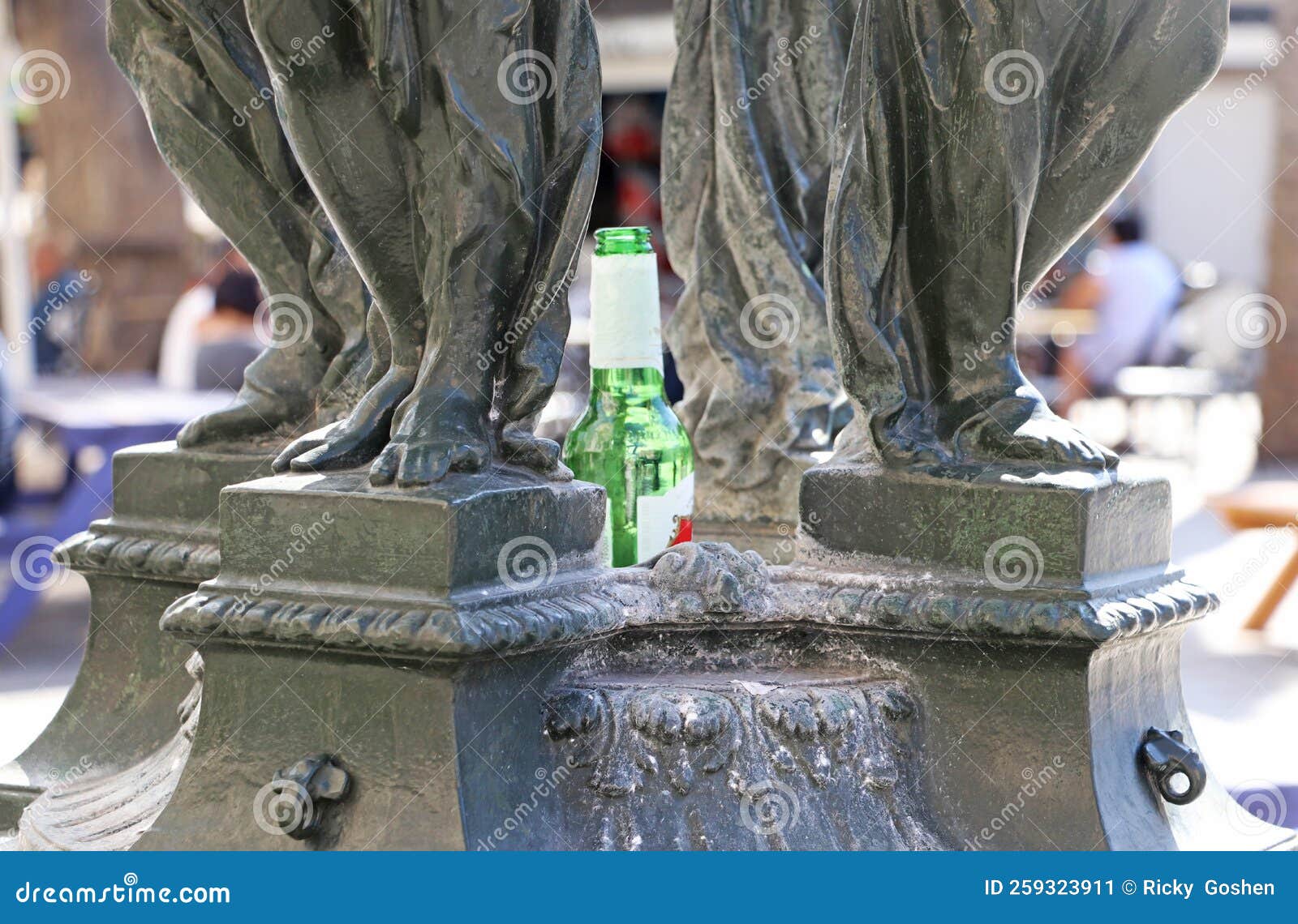 An Empty Beer Bottle is Placed Inside a Statue. Stock Image - Image of ...