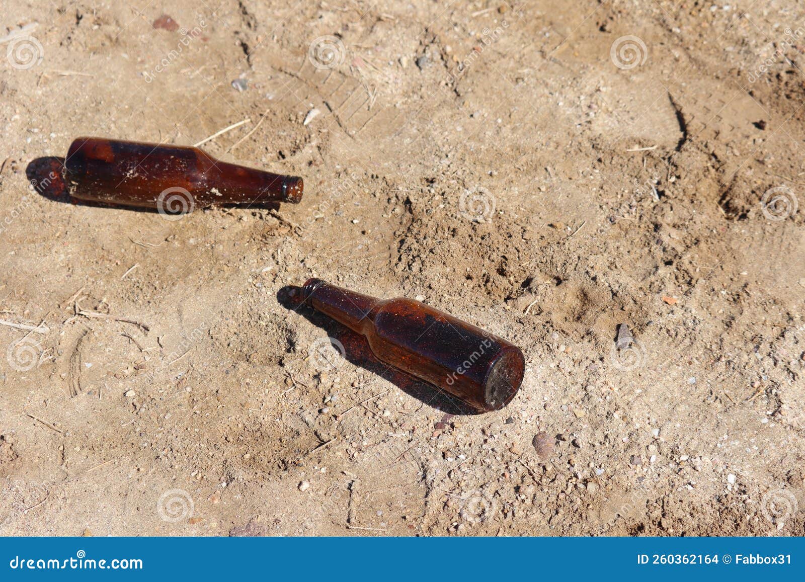 Empty Beer Bottles Discarded and Abandoned on the Beach. Stock Photo ...