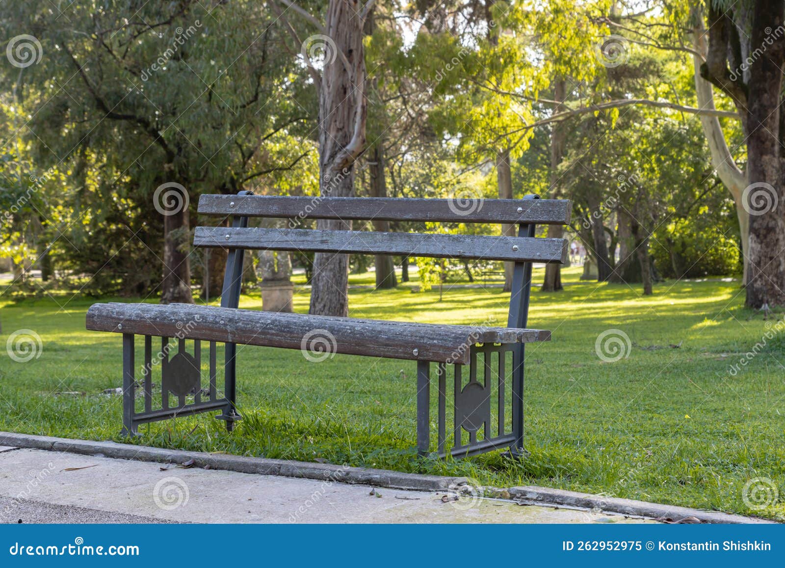 An Empty Bench in a Green Park by Walking Path Stock Image - Image of ...