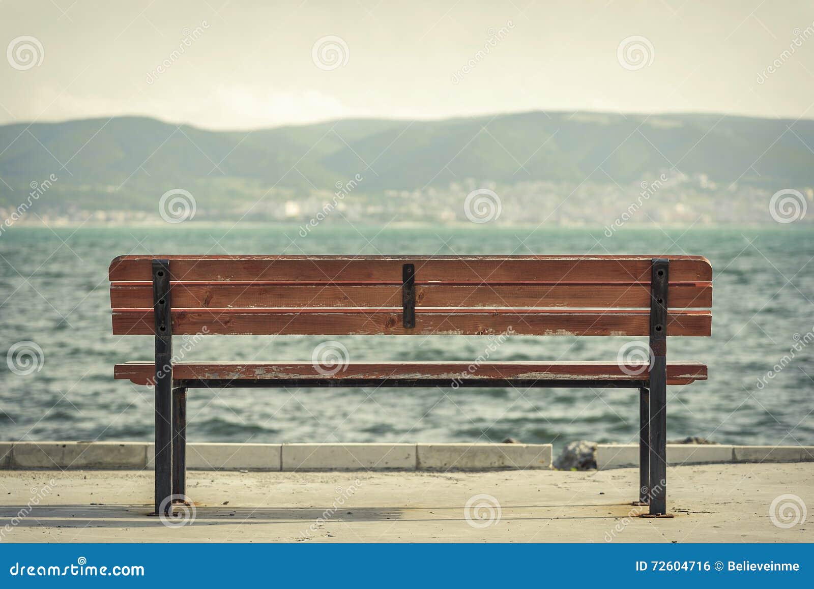 Empty bench and sea. stock photo. Image of moody, furniture - 72604716