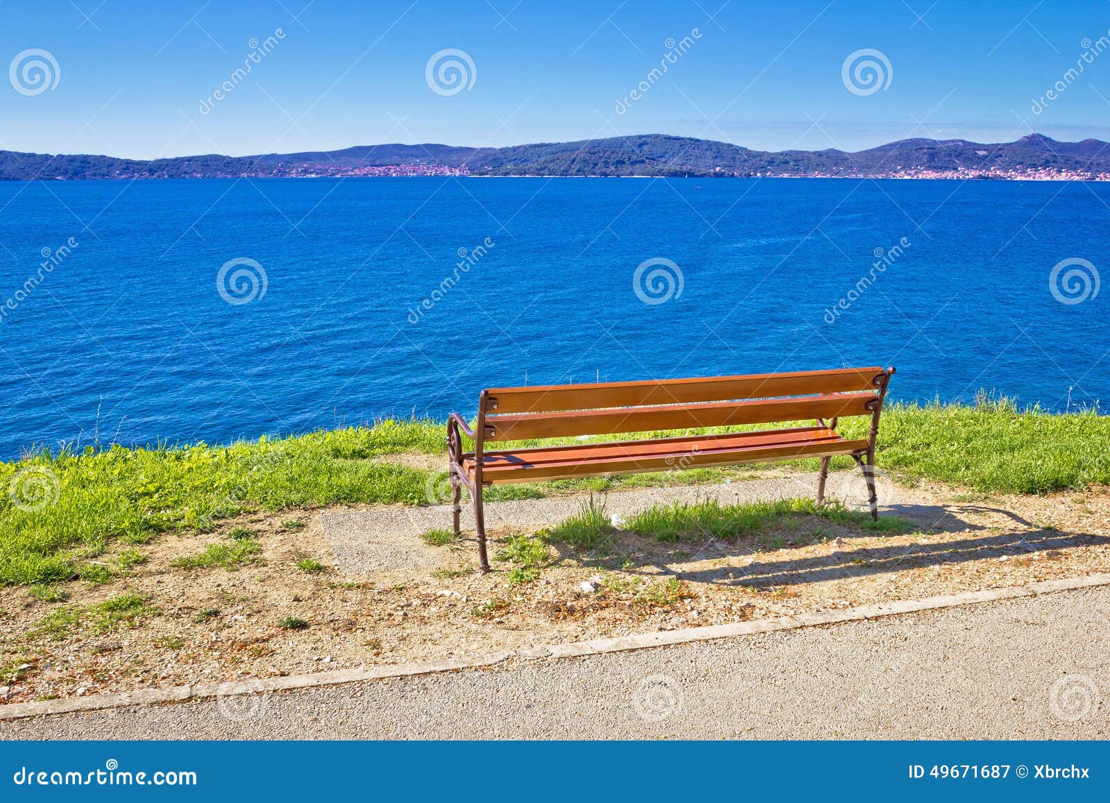 Empty bench by the sea stock image. Image of croatia - 49671687