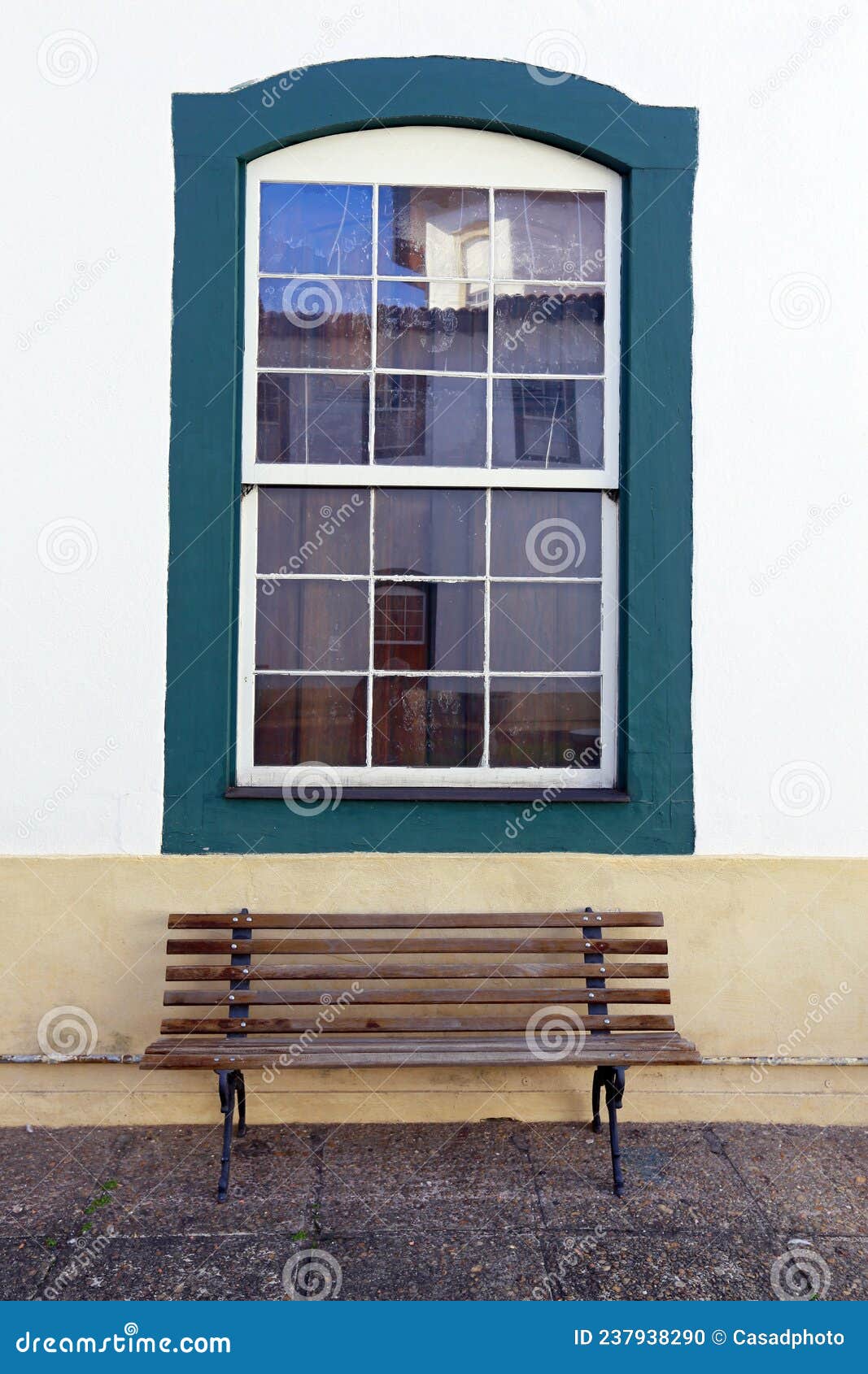 Empty Bench Under the Window in Colonial Style Stock Photo - Image of ...