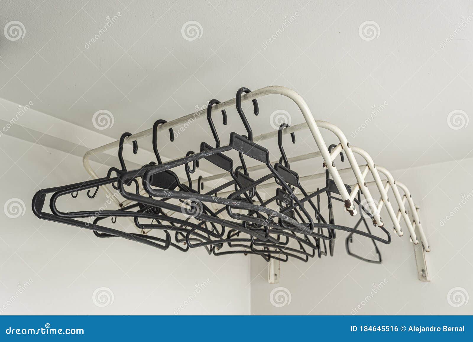 Empty Black Clothing Hook Over a White Clothes Line Stock Photo - Image ...