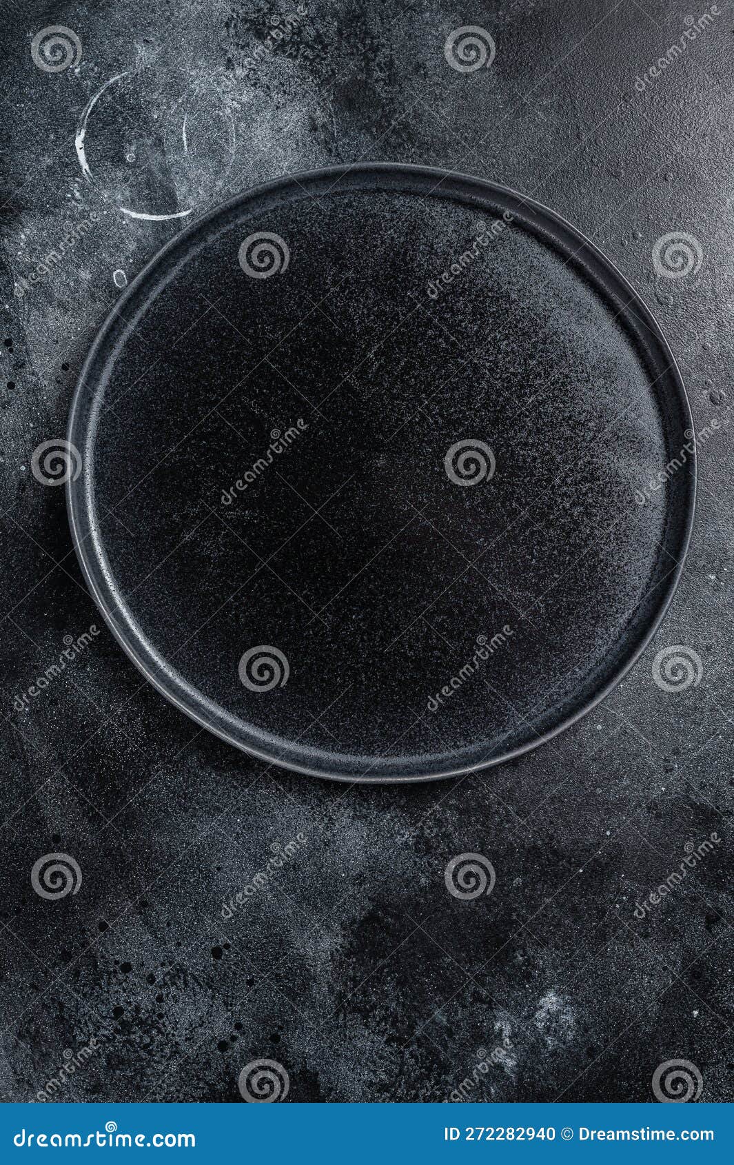 Empty Black Craft Plate on Table. Table Setting. Black Background. Top ...