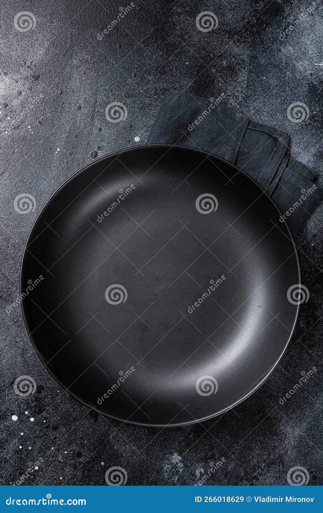 Empty Black Craft Plate on Table. Table Setting. Black Background. Top ...