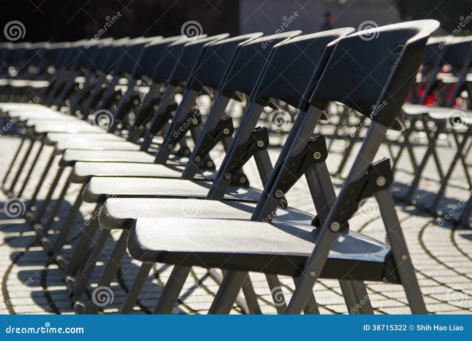 Empty black plastic chairs stock photo. Image of entertainment - 38715322