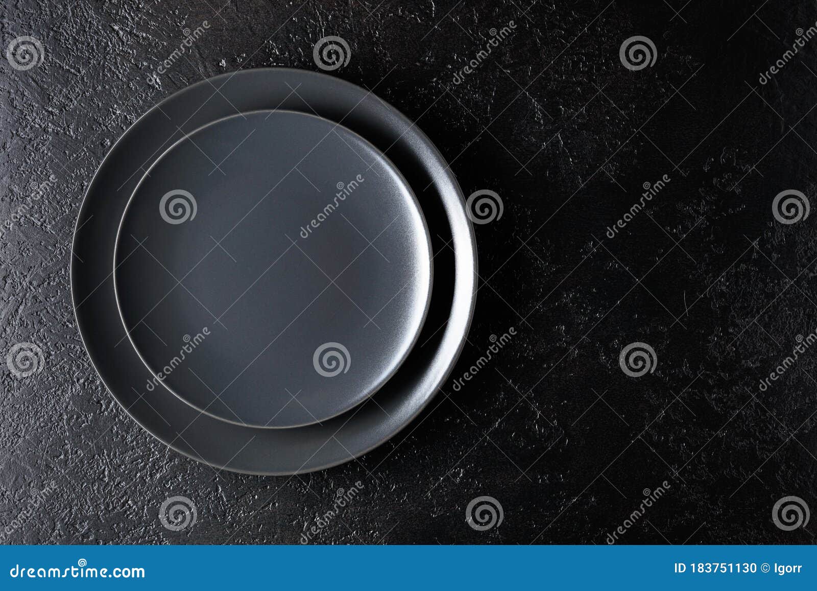 Empty Black Plate on a Black Background. Top View Stock Photo - Image ...