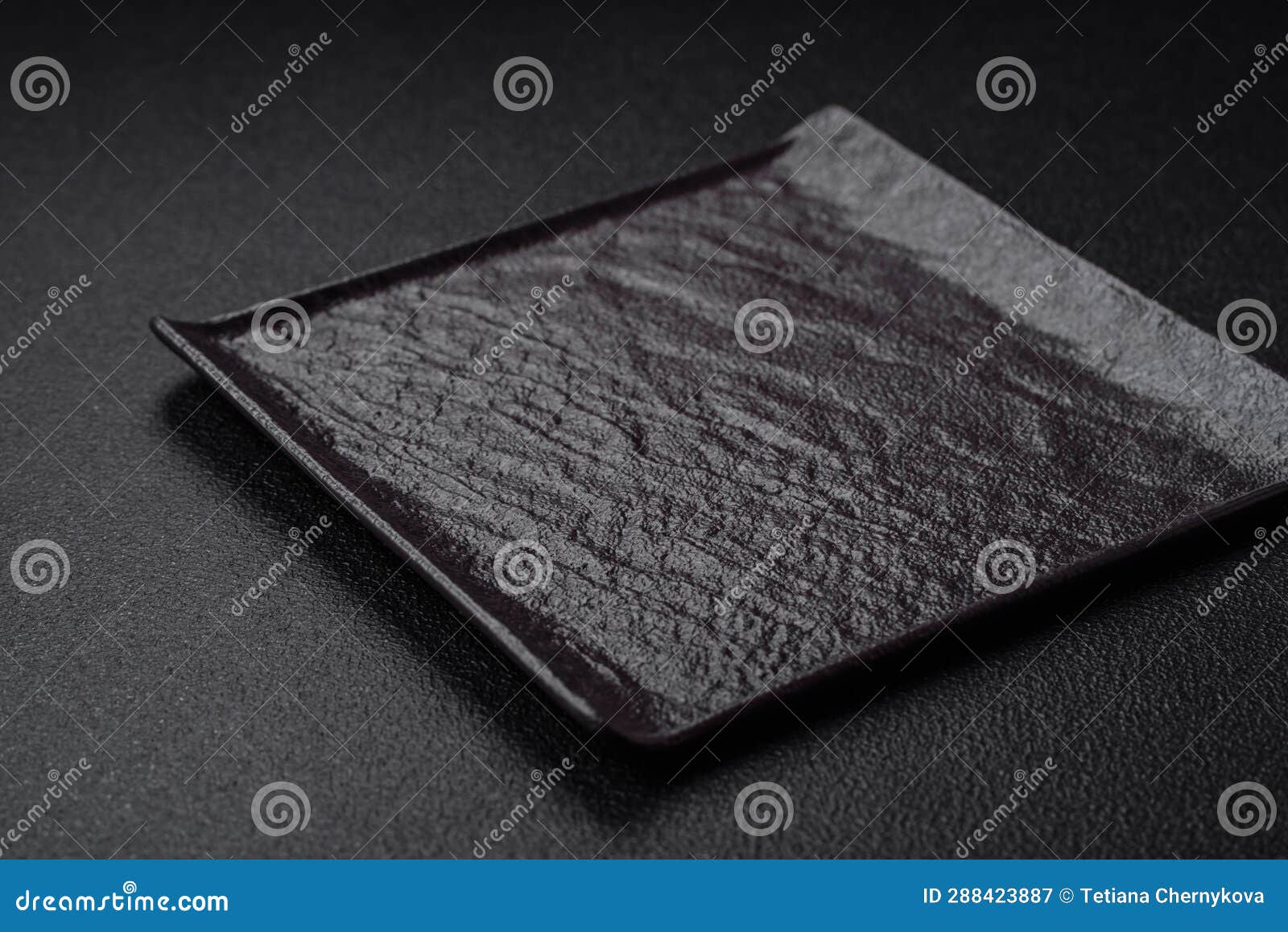Empty Black Square Ceramic Plate on Dark Concrete Background Stock ...