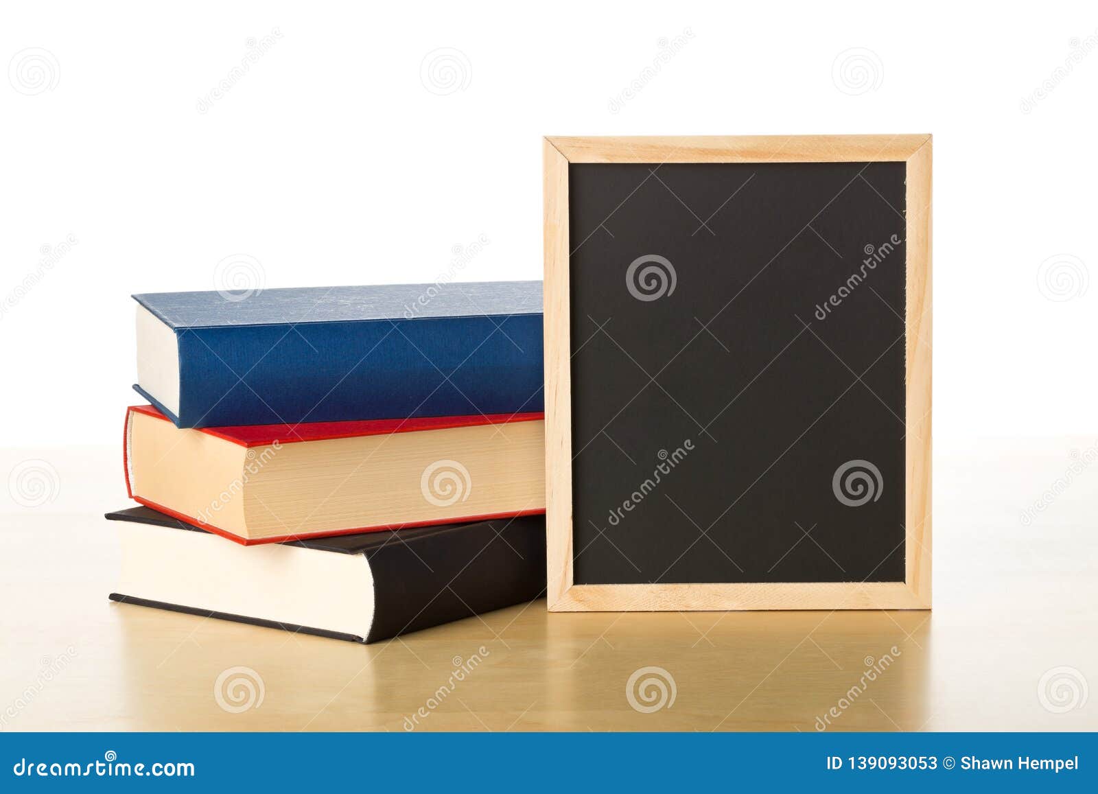 Empty, Blank, Black Chalkboard with Stack of Books on Brown Wooden Desk ...
