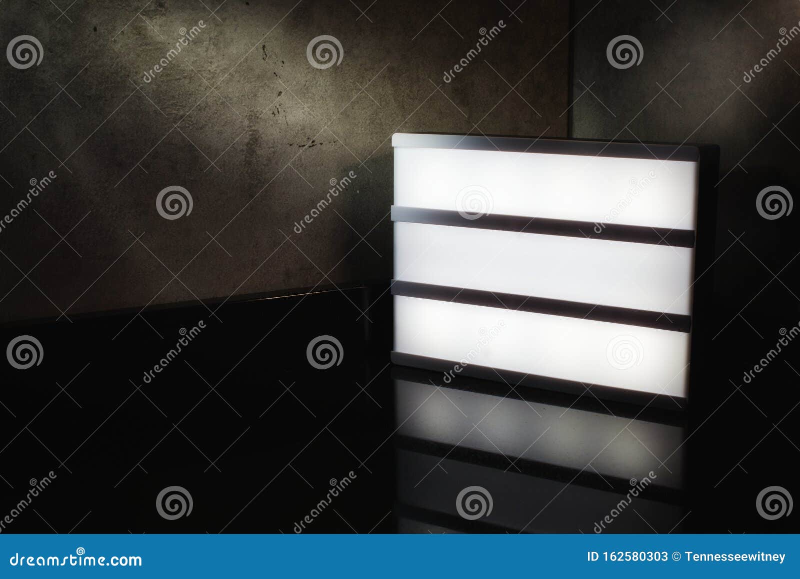 An Empty Blank Light Box in a Cinematic Moody Background Stock Image ...