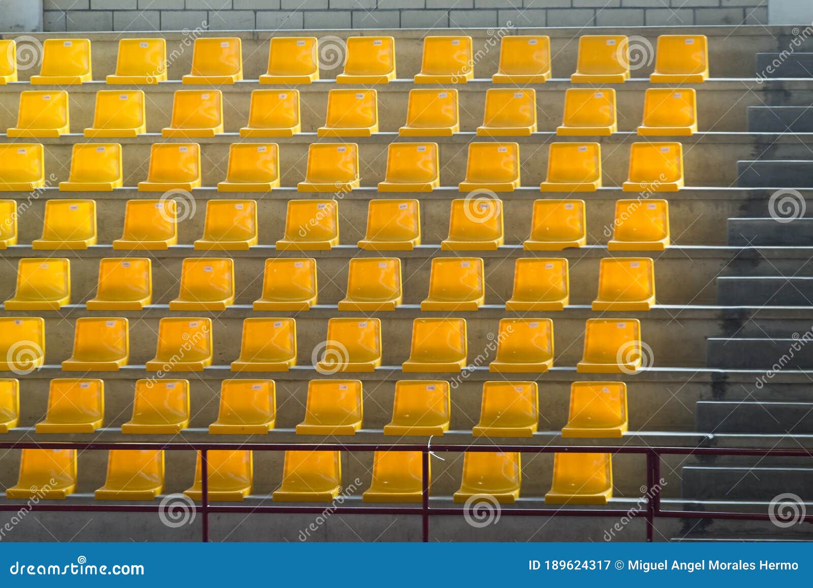 Empty Bleachers with Yellow Seats in a Sports Hall Stock Image - Image ...