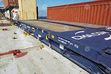 Empty Blue Flat Rack Container Secured on Deck of Container Vessel ...