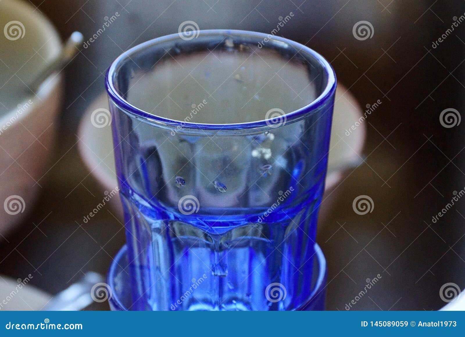 Empty Blue Glass Cup with Water Drops Stock Image - Image of blue, full ...