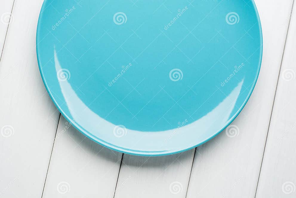Empty Blue Plate on White Plank Background Stock Image - Image of ...
