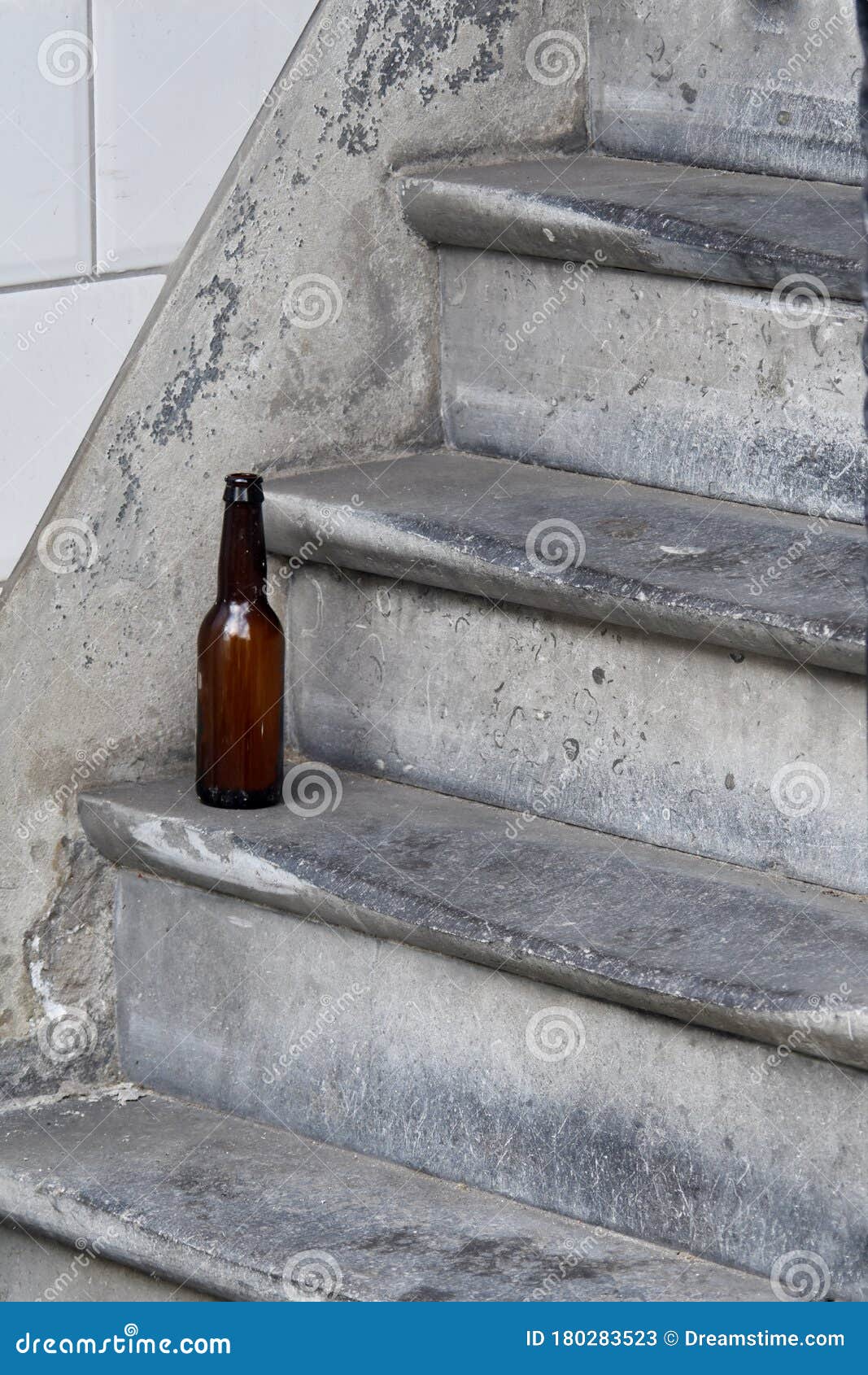 Empty Bottle from Under Beer on the Stone Steps of the Stairs Stock ...