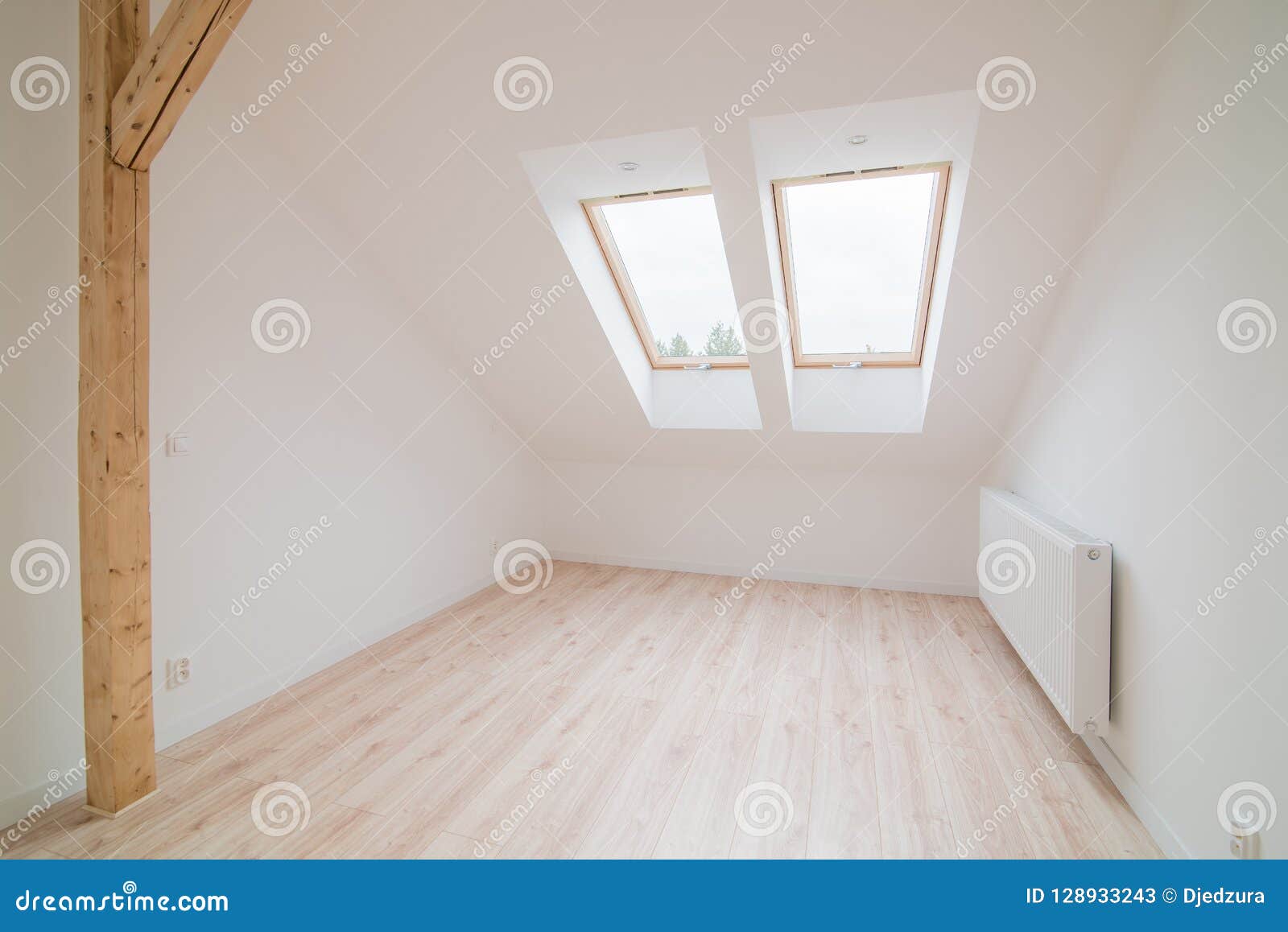 Empty bright attic room. stock image. Image of design - 128933243