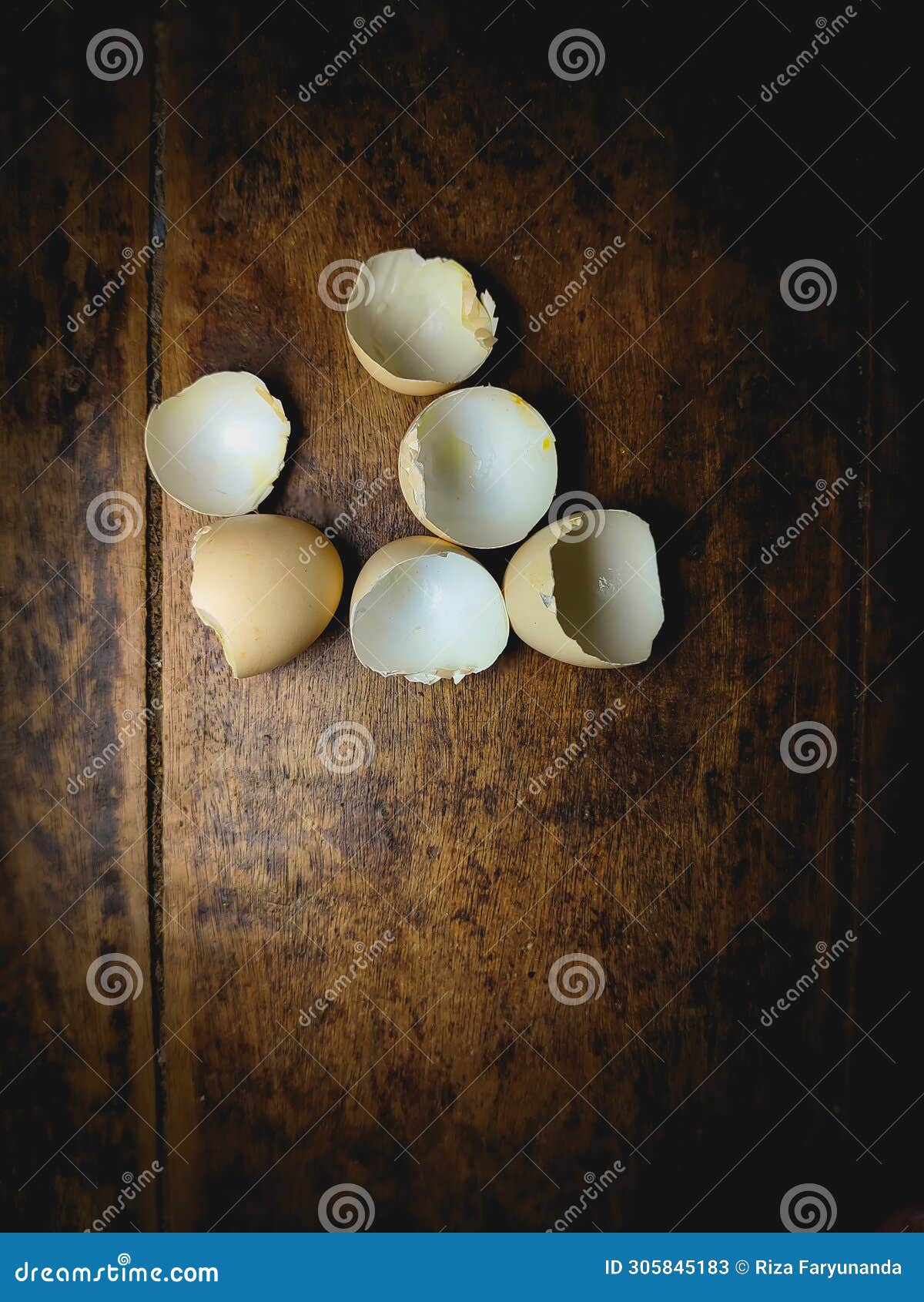 An Empty Broken Chicken Egg Shell without Its Contents on an Old Wooden ...