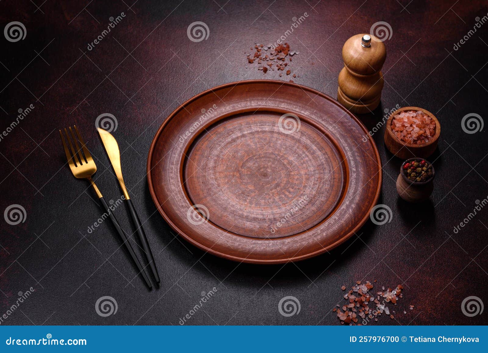 An Empty Brown Ceramic Plate on a Dark Concrete Brown Background Stock ...