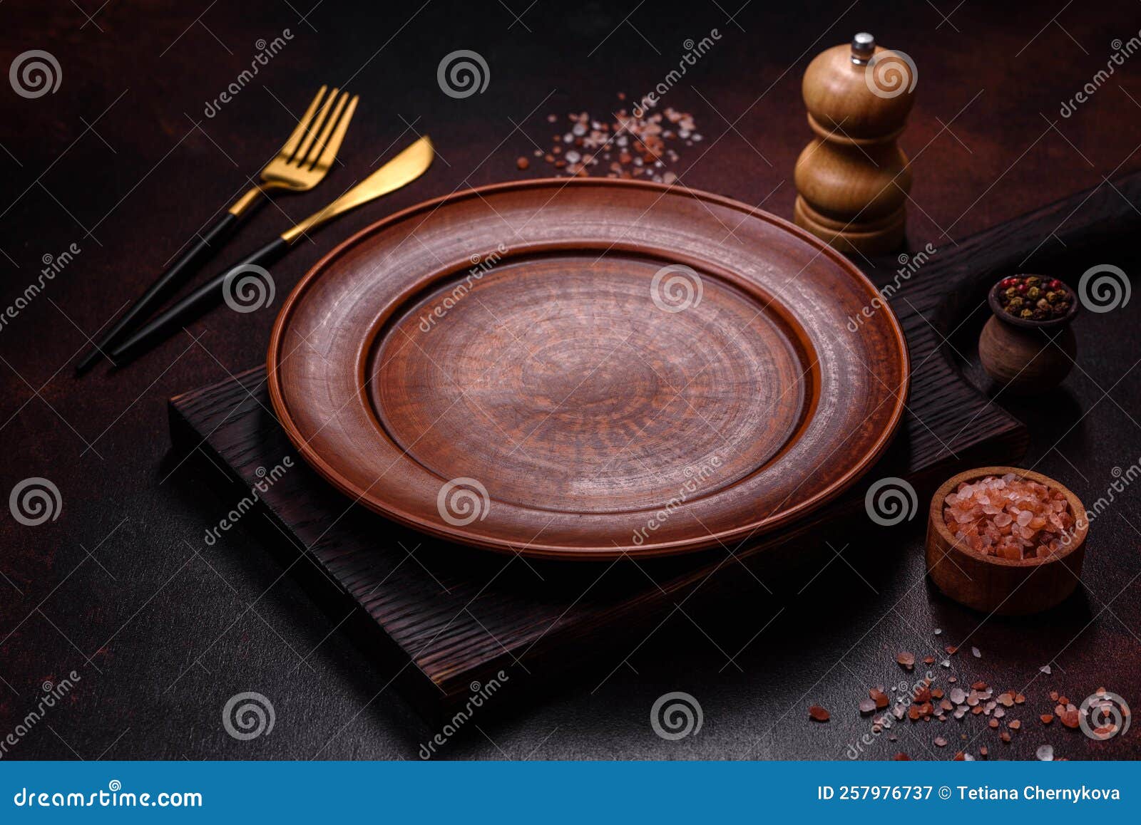 An Empty Brown Ceramic Plate on a Dark Concrete Brown Background Stock ...